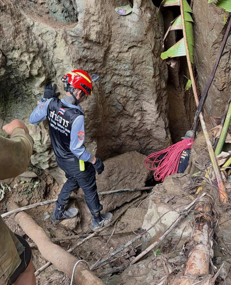 Rescuers race to reach 7 trapped in a Laos cave after flash floods ...