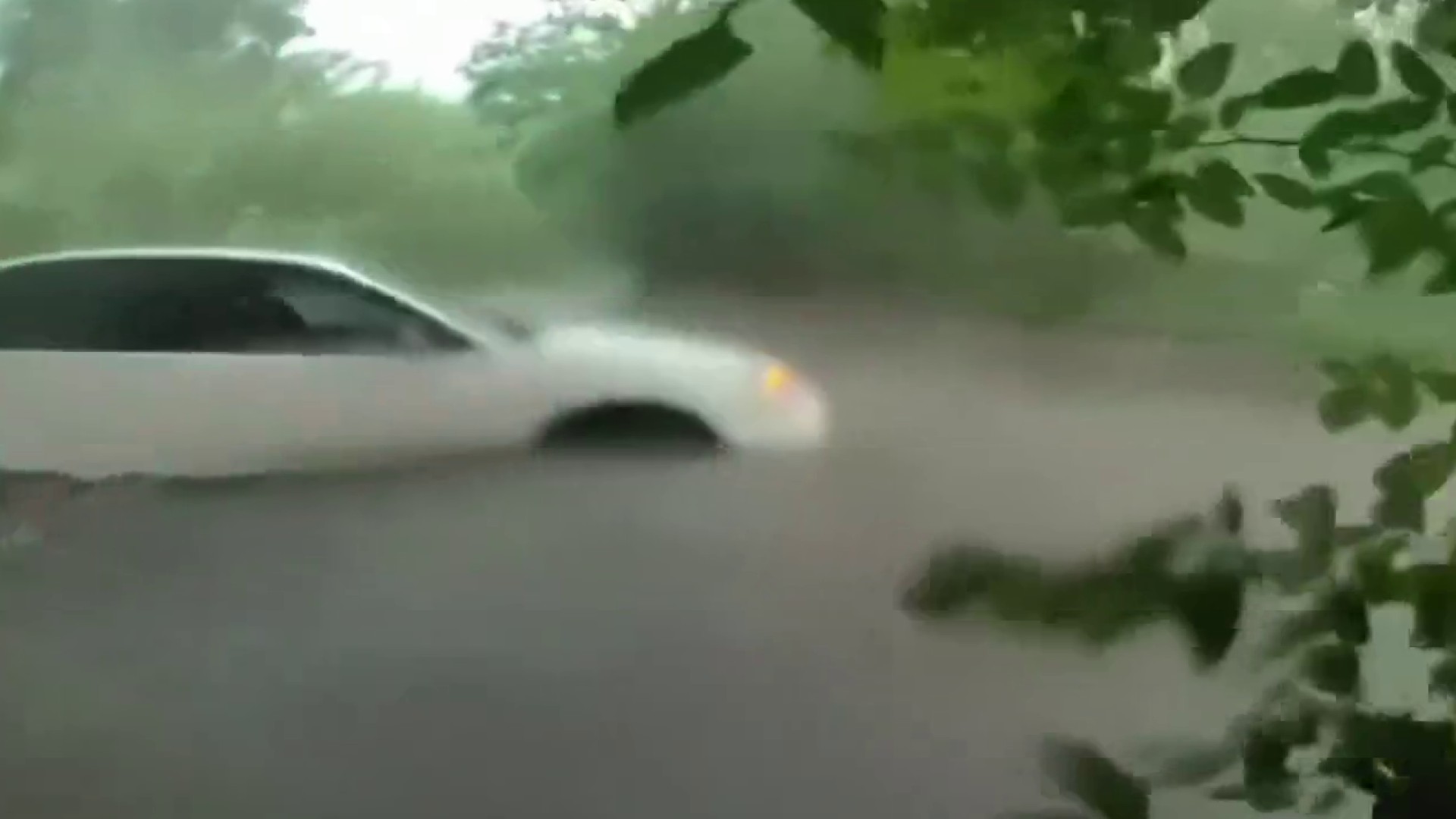 Officers rescue infant from flooded car in Texas as storms snarl ...