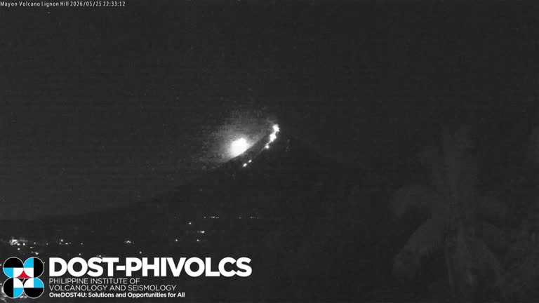 Meteor flies past erupting Mayon volcano in Philippines