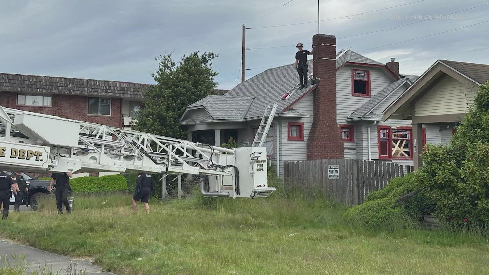 Fire crews extricate suspect who became stuck in chimney