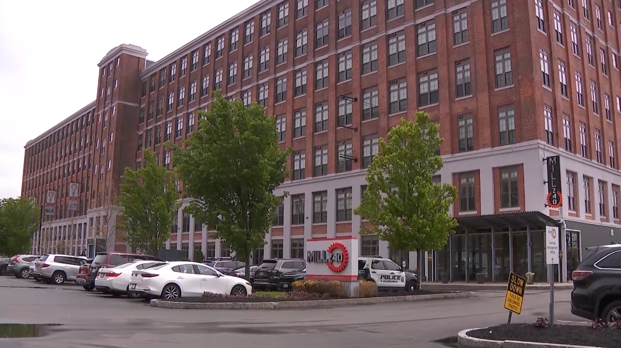 Man charged with murder after woman found dead in Lawrence apartment