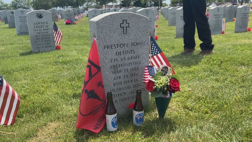 Flags line headstones, community honors fallen heroes, including Gold ...