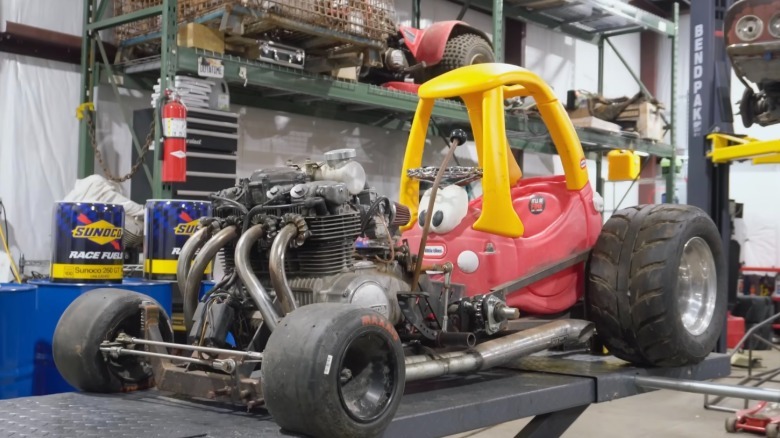 Man sticks power washer engine in Barbie Power Wheels car to keep gas ...