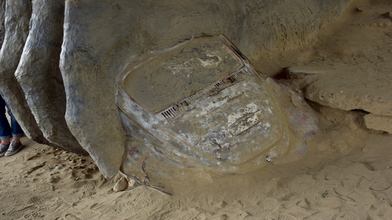 Under a Seattle bridge, a 13,000-pound troll has gripped a real car ...