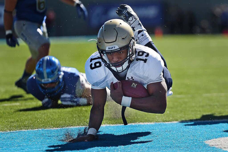 Football hits too mild to cause concussions may still change players’ gut