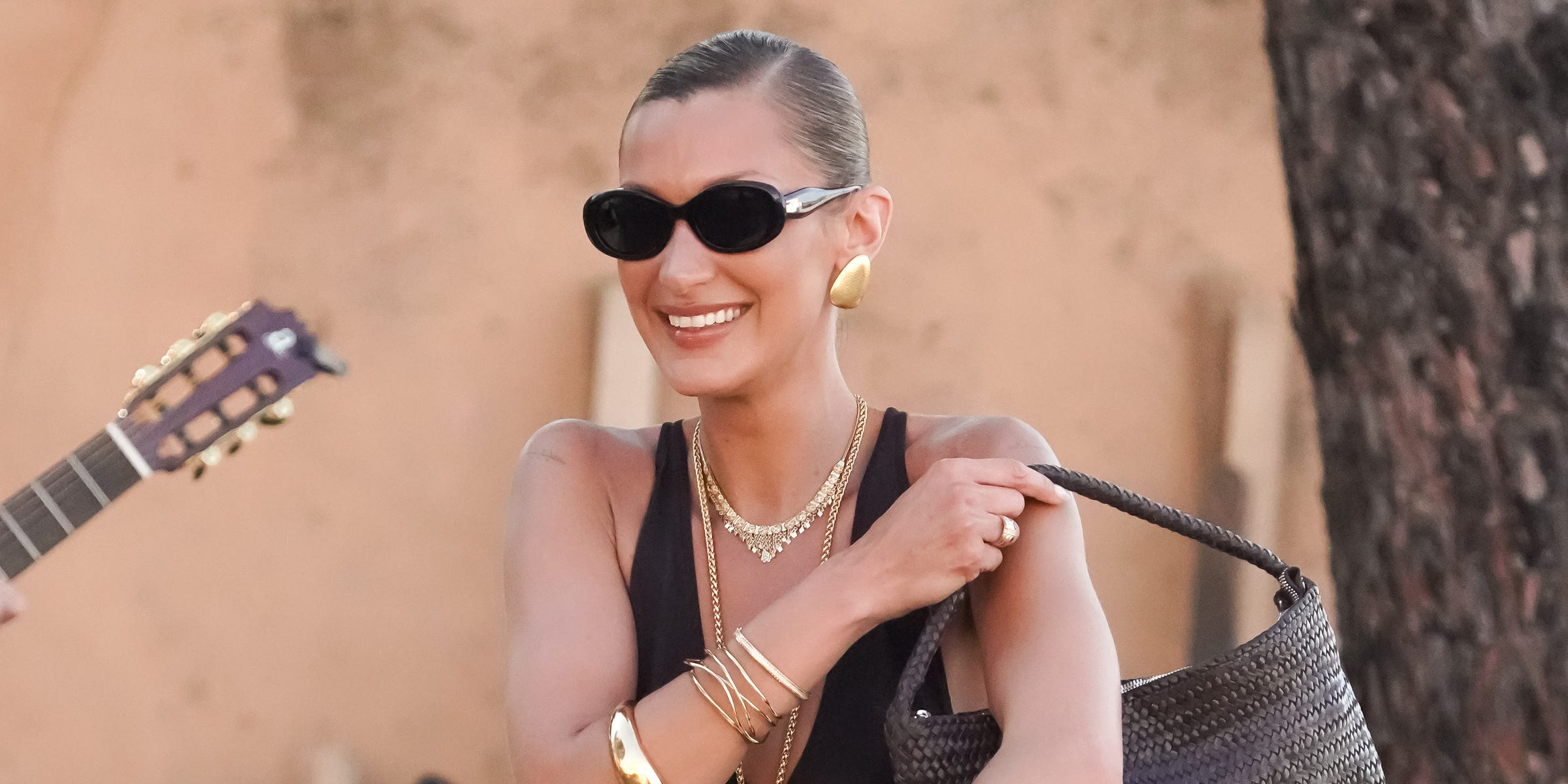 Bella Hadid wears a colorful vintage-style one-piece in Saint-Tropez