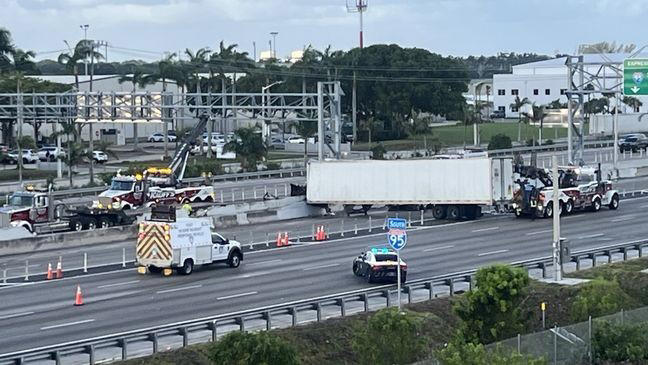 Semi-truck crashes over barrier, spills diesel fuel on I-95 in Boca Raton