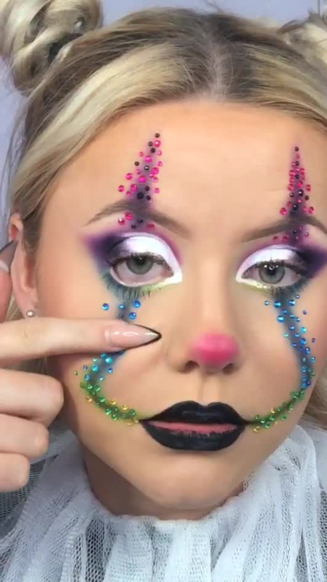 Inside the clown makeup look everyone keeps rewatching