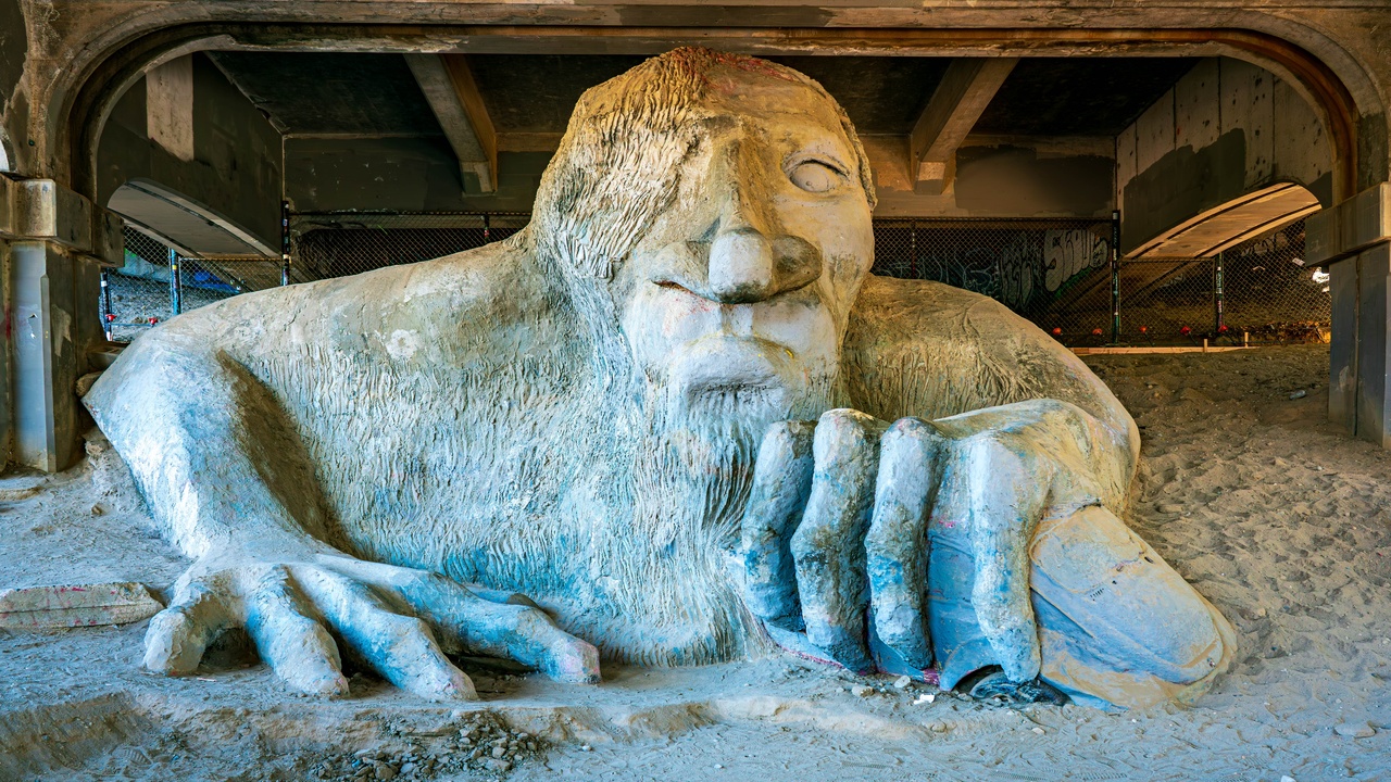 Under a Seattle bridge, a 13,000-pound troll has gripped a real car ...