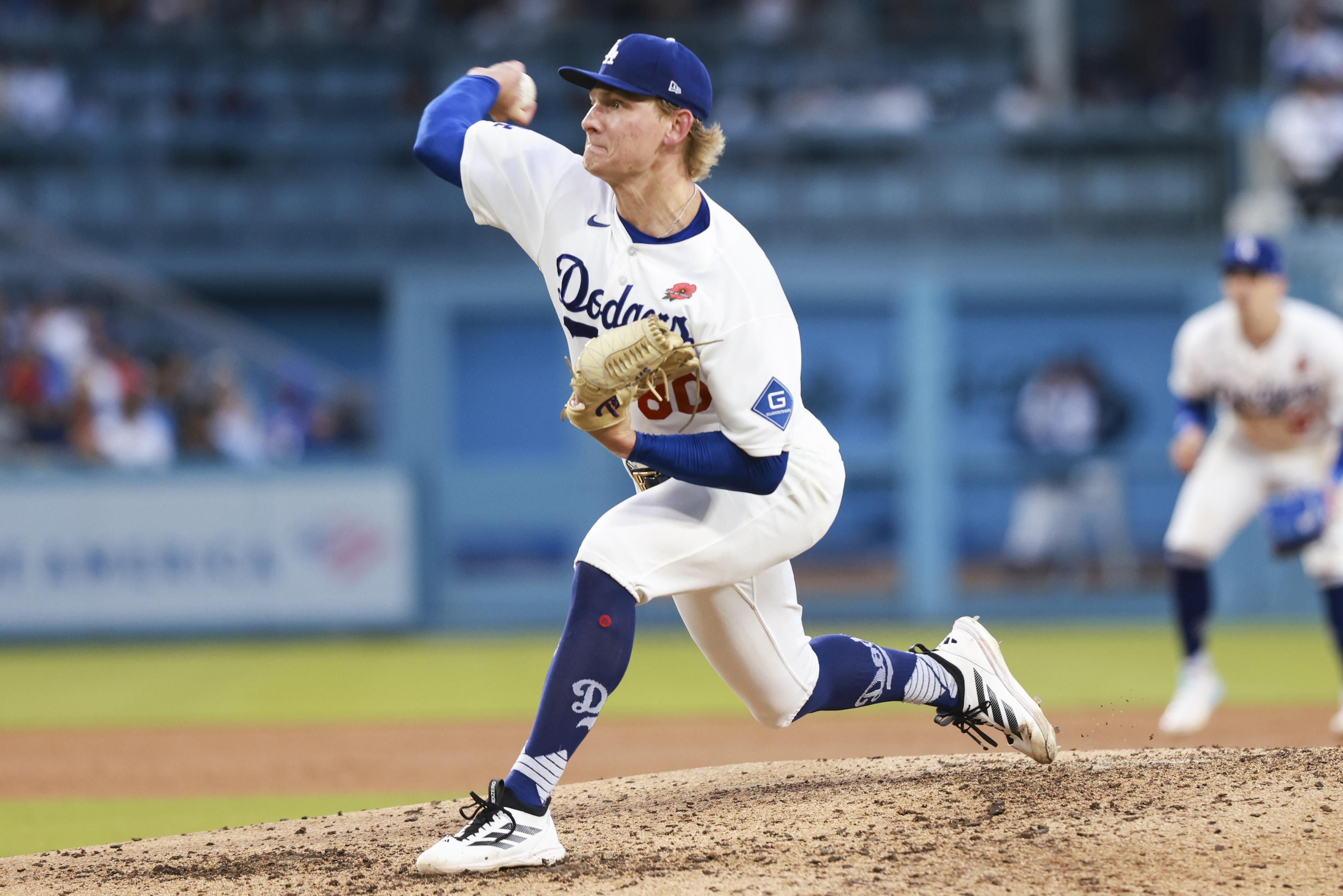 Dodgers wait out the Rockies in win at home