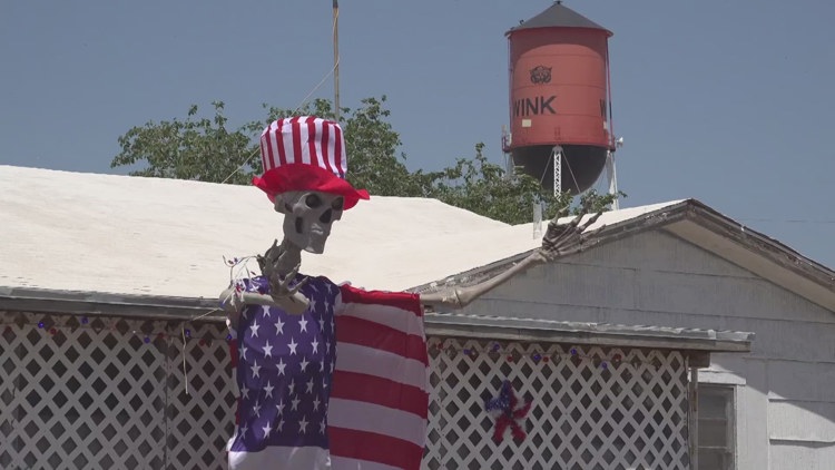 Wink woman turns heads with hand-crafted Memorial Day yard display