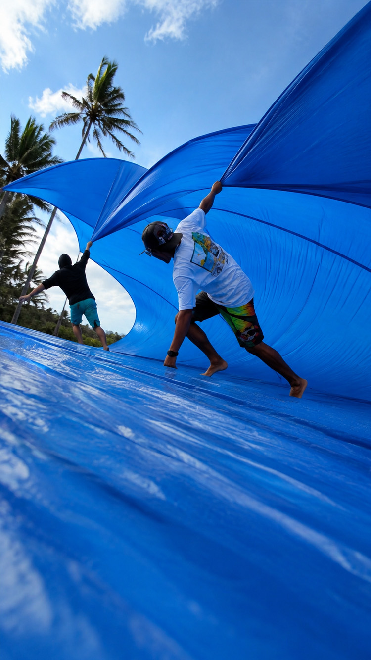 Giant tarp wave turns backyard into surf spot