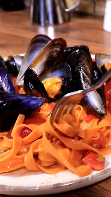 Handmade tomato linguine with mussels