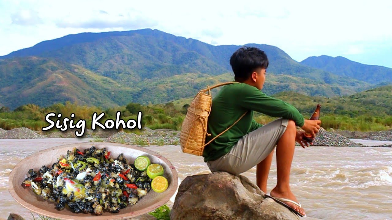 Cooking fresh river snails into crispy sisig pulutan