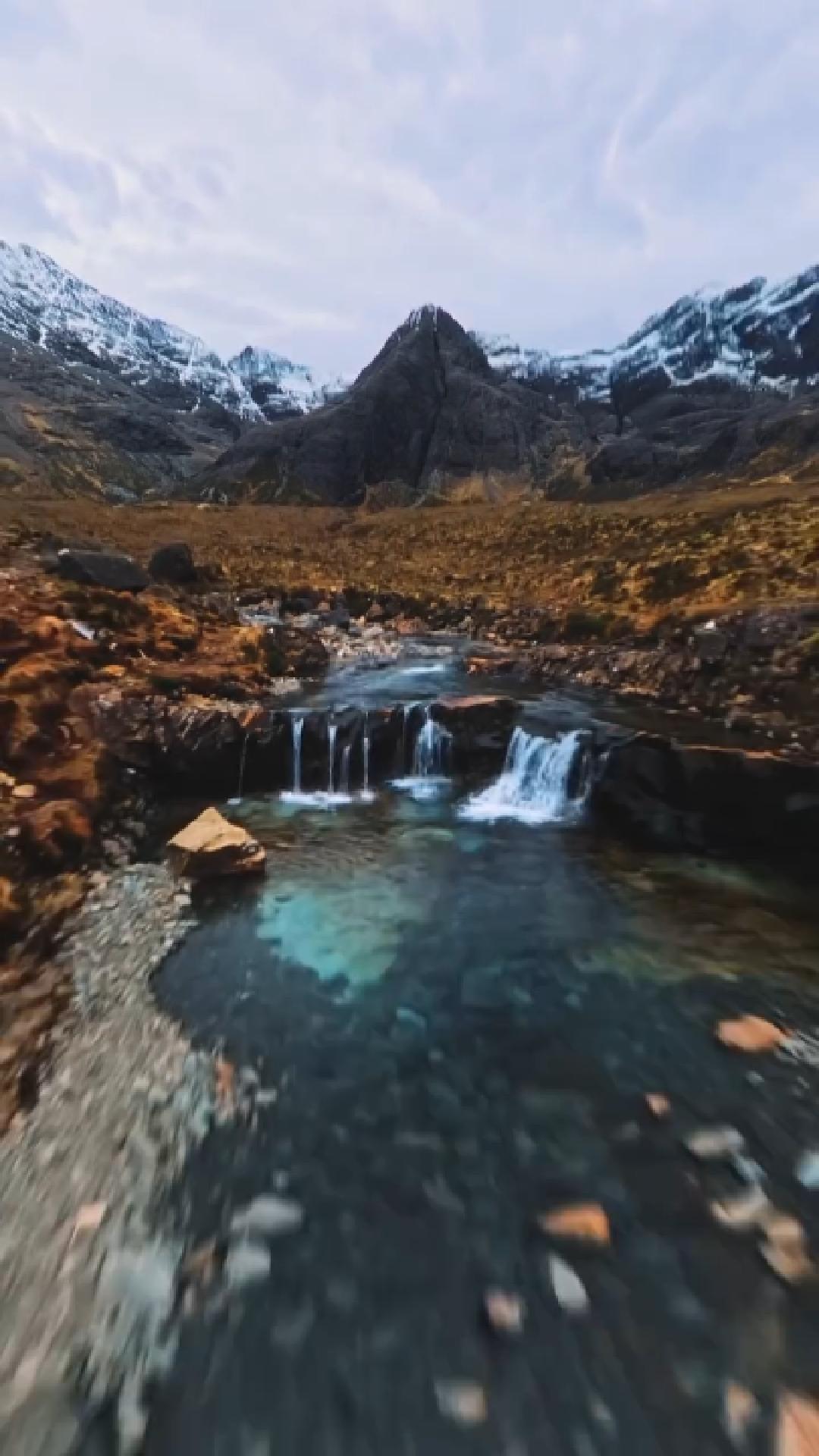 This backward framed drone shot looks absolutely unreal