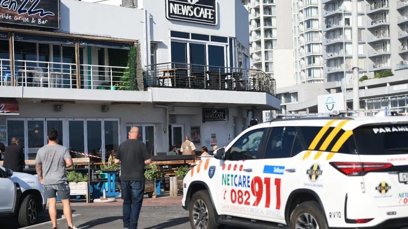 Brazen killers fire six shots into patron before taking off with laptop ...