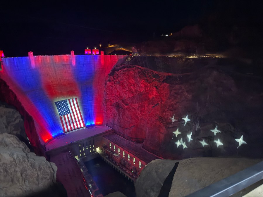 Flag returned to holiday display at Hoover Dam after repairs