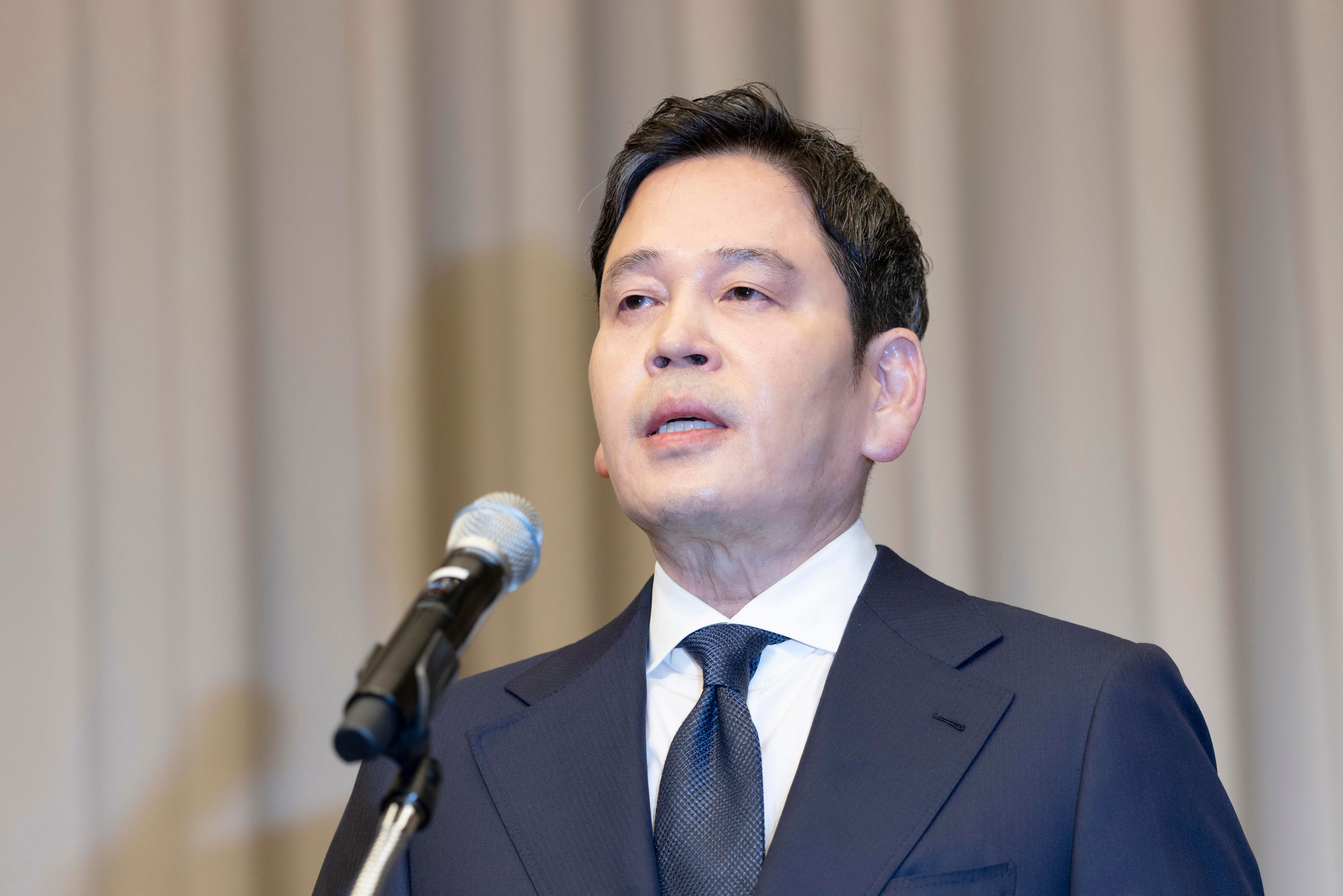 South Korean Starbucks boss apologizes for ad campaign that evoked massacre
