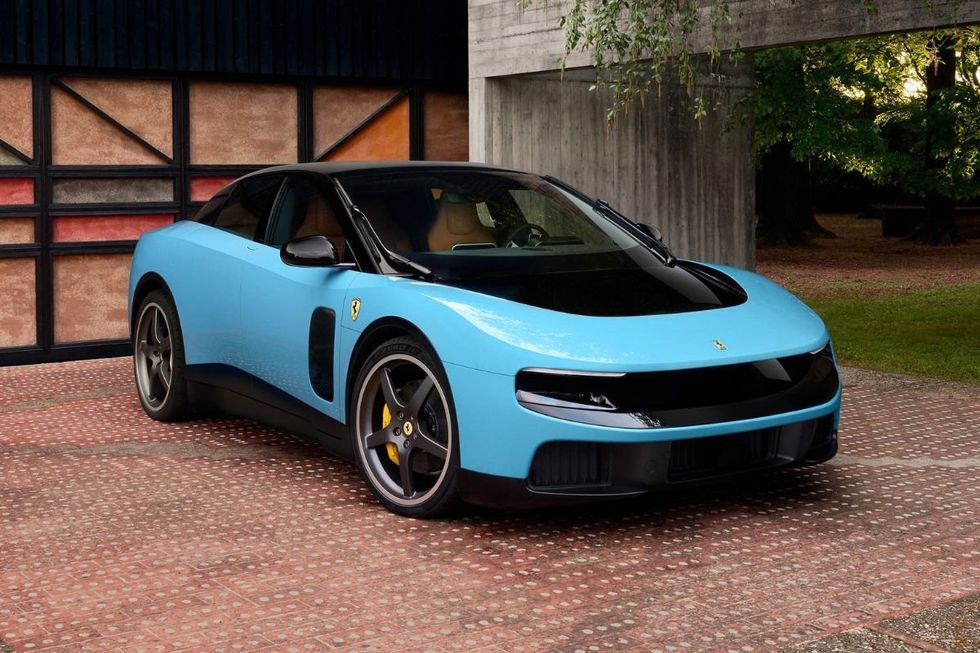 Ferrari unveils first electric car with 329-mile battery range and huge ...