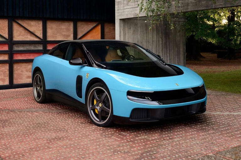 Ferrari unveils first electric car with 329-mile battery range and huge ...