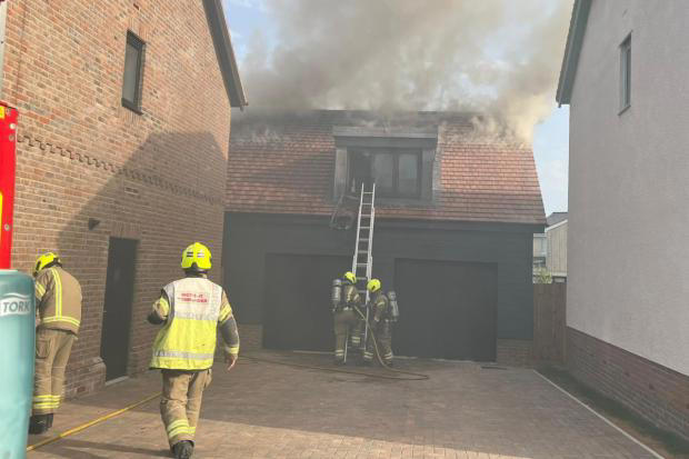 Fire crews tackle early morning blaze at converted garage