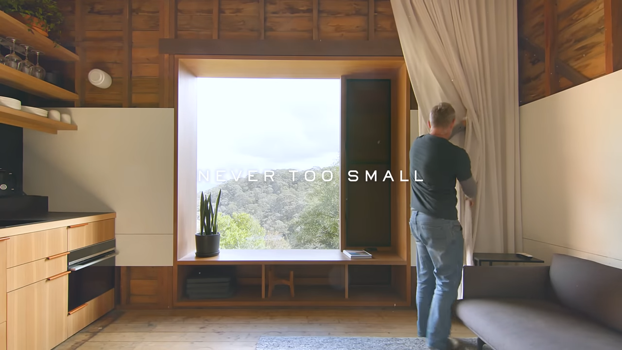 Watch this small cabin open to a massive mountain view – and it’s stunning