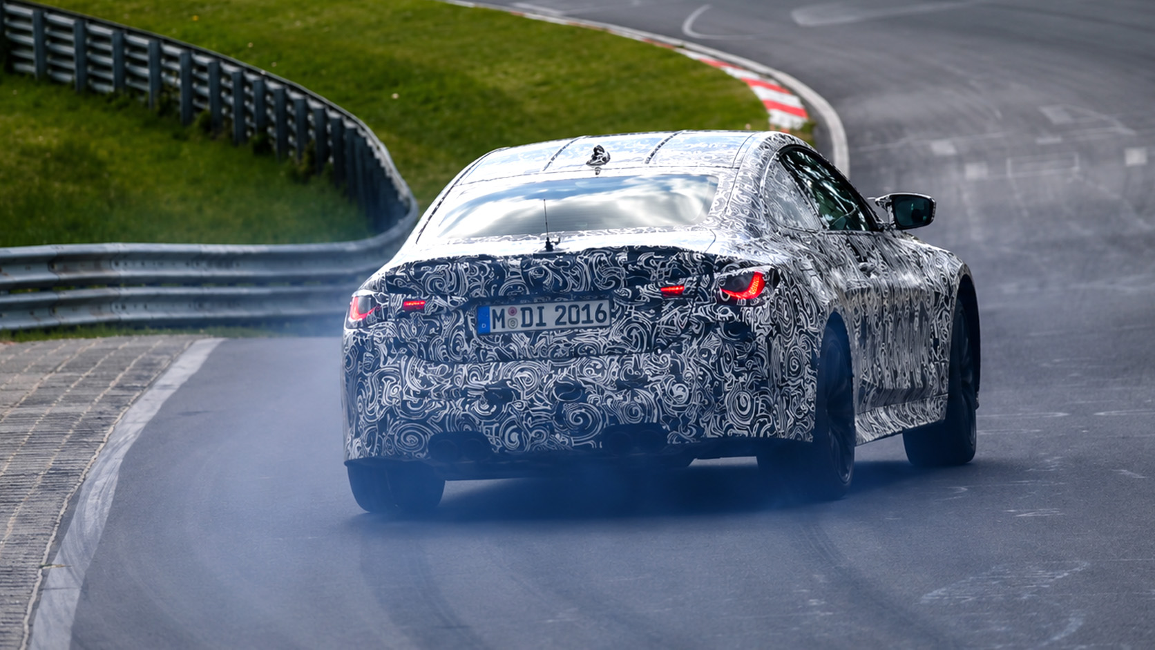 Prototype car loses grip and slides off mid-corner