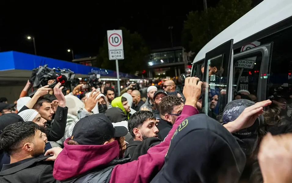 ISIS-linked women and children arrive in Australia under tight security