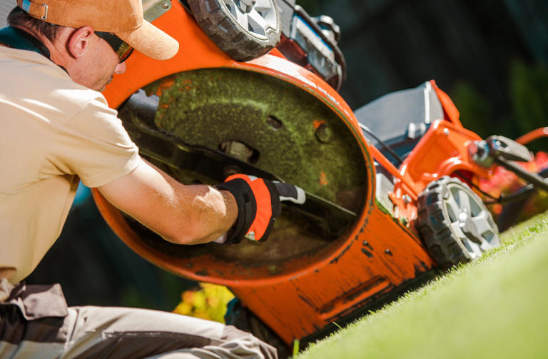 Why the grass caked under your mower deck is quietly ruining it