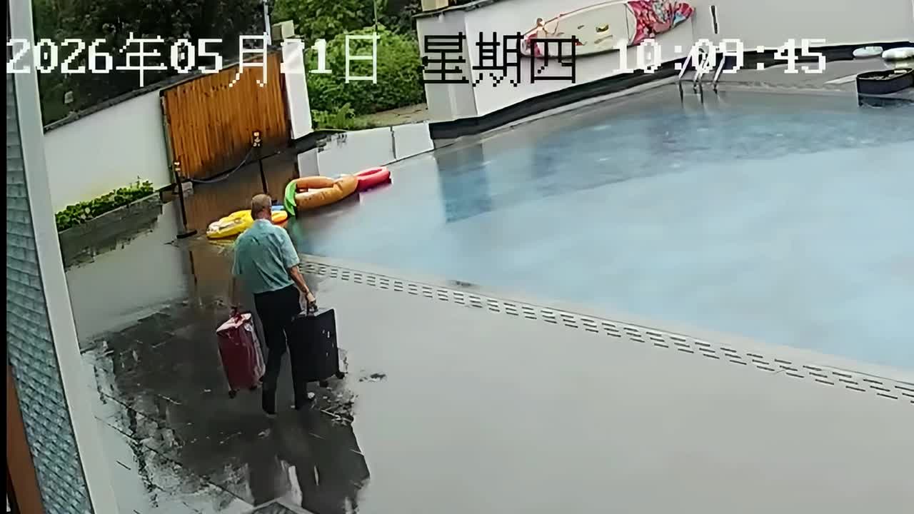 Hilarious moment driver plunges into hotel swimming pool after ...