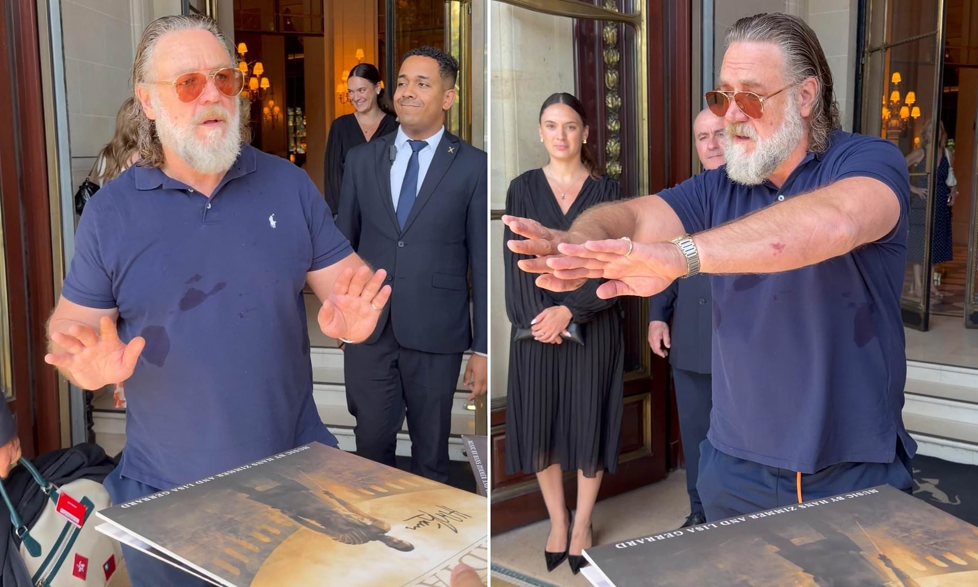 Angry Russell Crowe scolds fans waiting for his autograph outside Paris ...