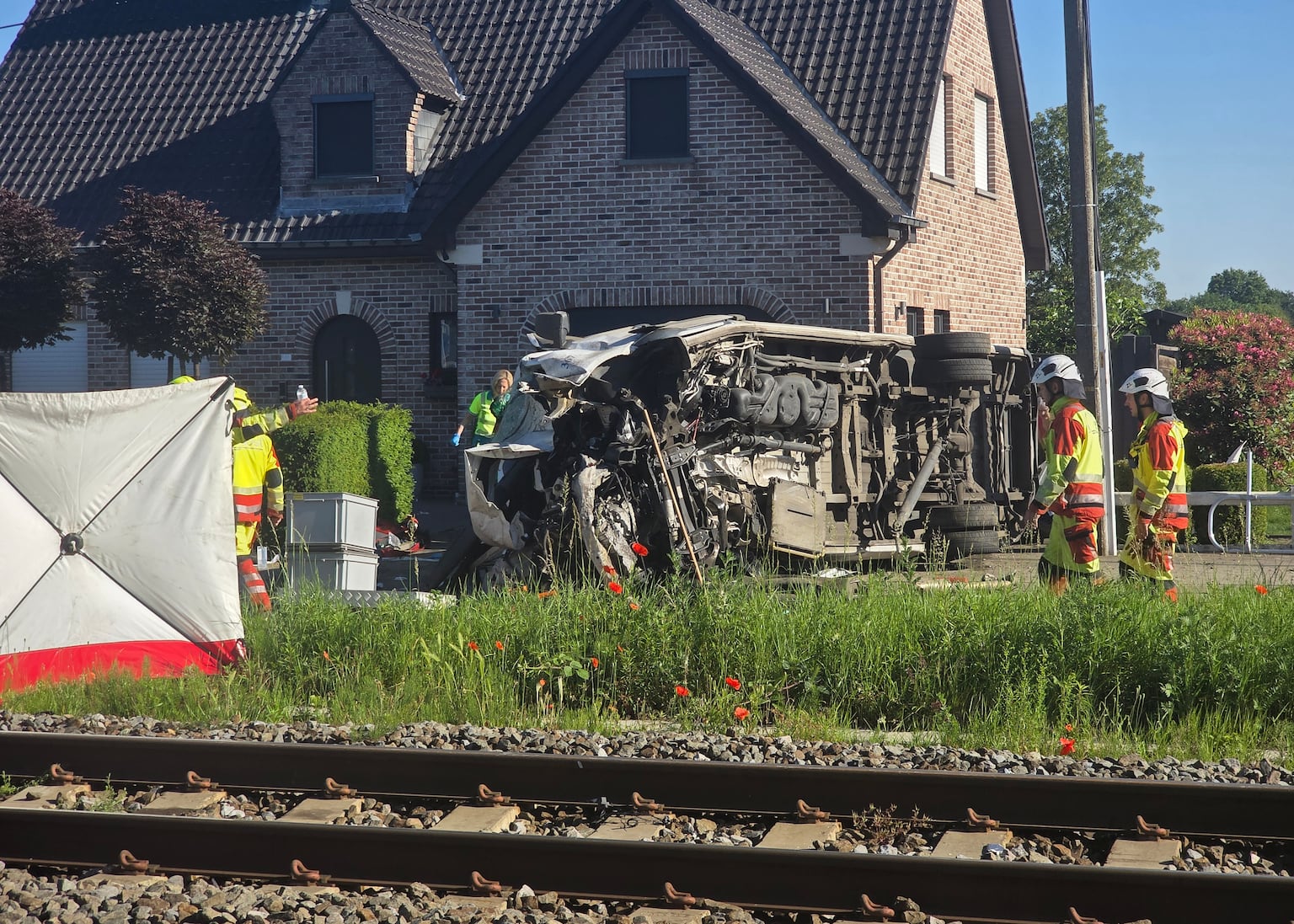 Several hurt in crash between train and minibus carrying children in ...