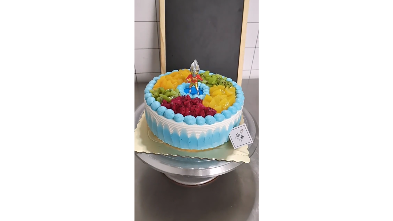 Decorating blue ocean theme cake with anime hero topper and fresh ...