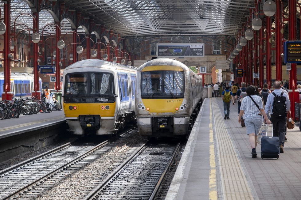 Commuters booted off sweltering train 40 miles from destination after ...