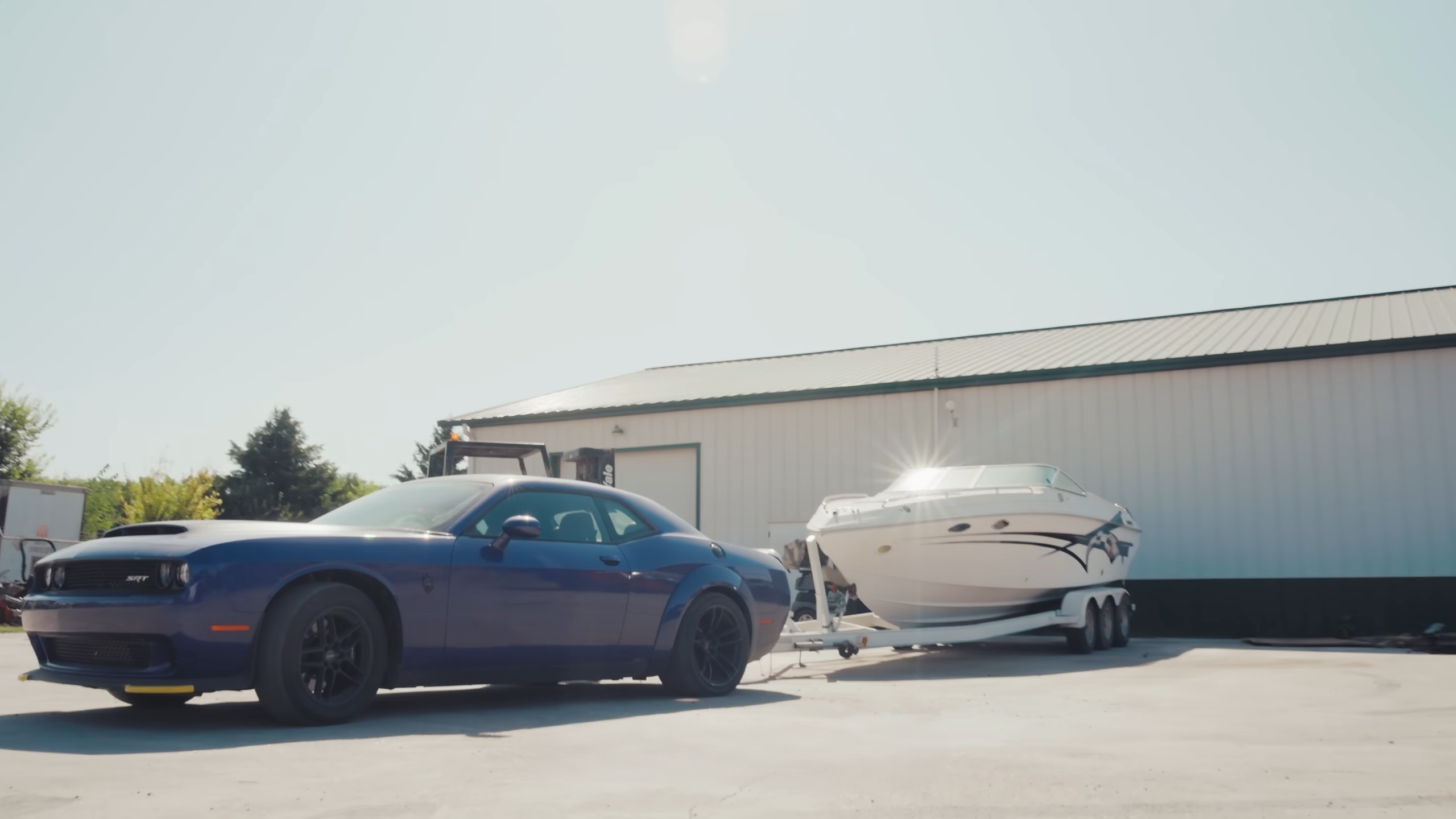 Watch what happens when I tried towing a boat with a race car