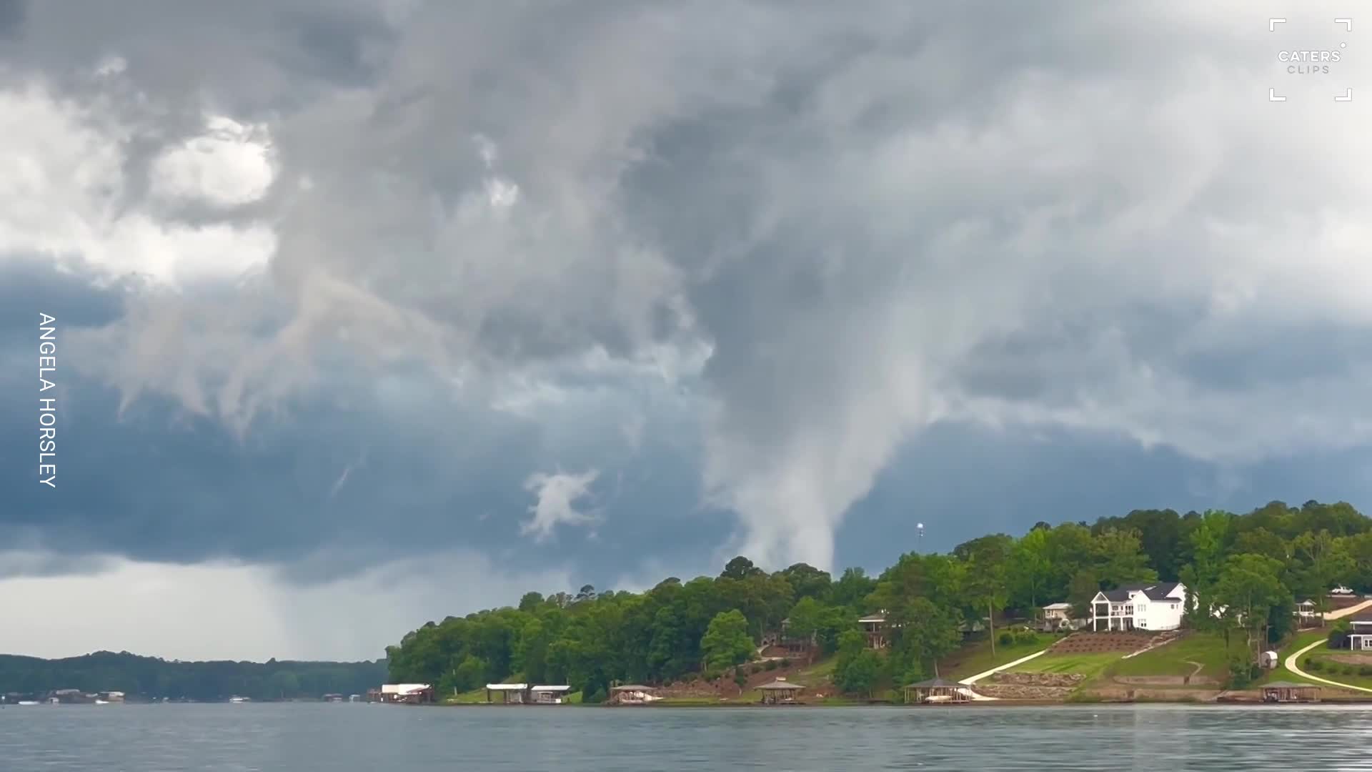 Thunderstorms roll across Alabama River in dramatic weather scene