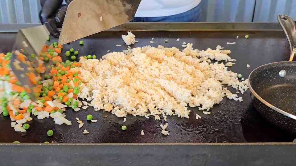 Simple Blackstone shrimp fried rice that tastes amazing