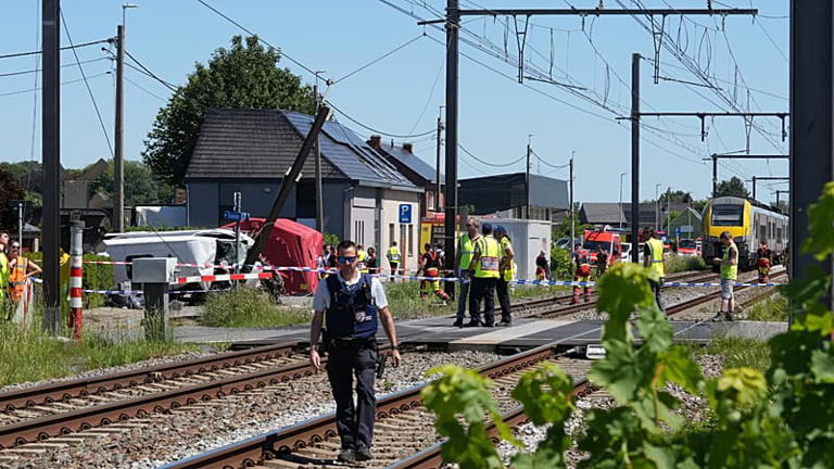 Four dea and, two injured after train hits school bus in Belgium ...