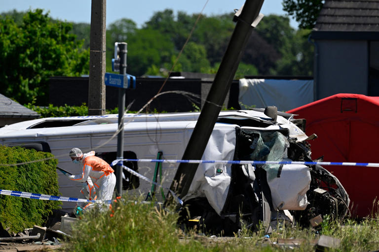 Two teenagers among four dead after train collides with school bus
