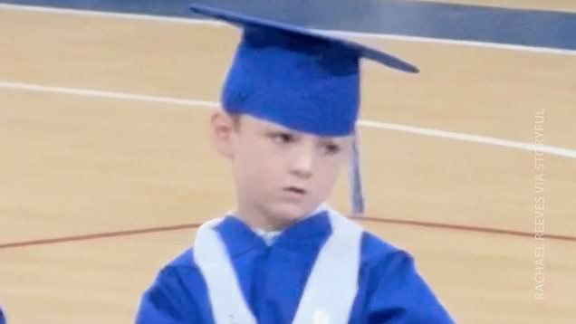 Boy's bored reactions steal the show at graduation