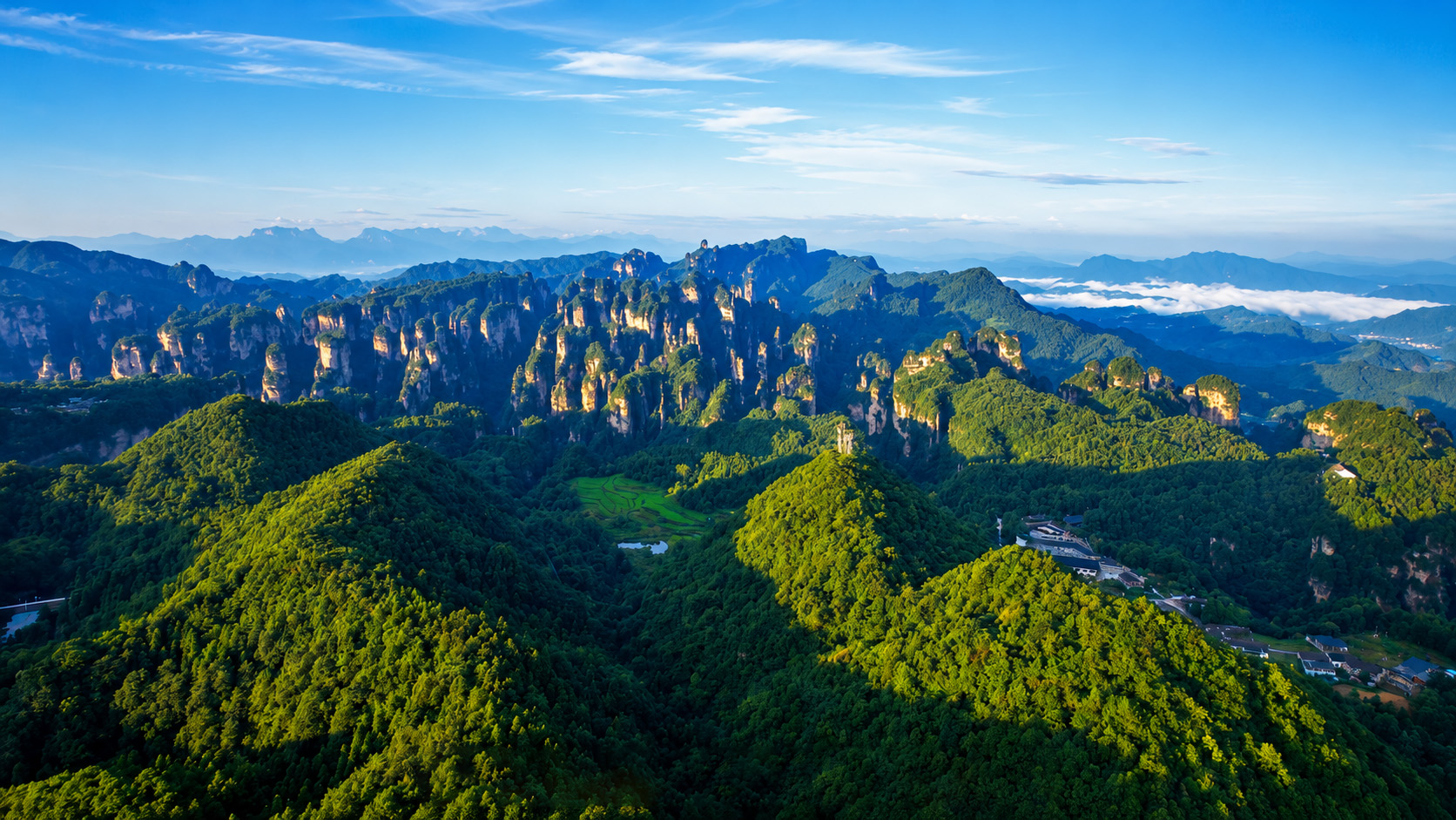 Zhangjiajie’s stone pillars rising like mountains from another world