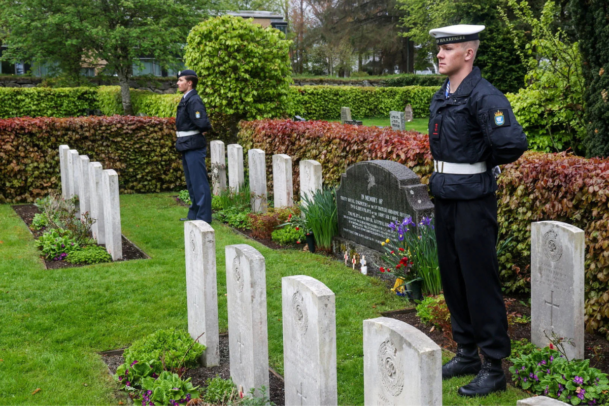 Sombre HMS Prince of Wales sailors pay tribute to those killed after ...