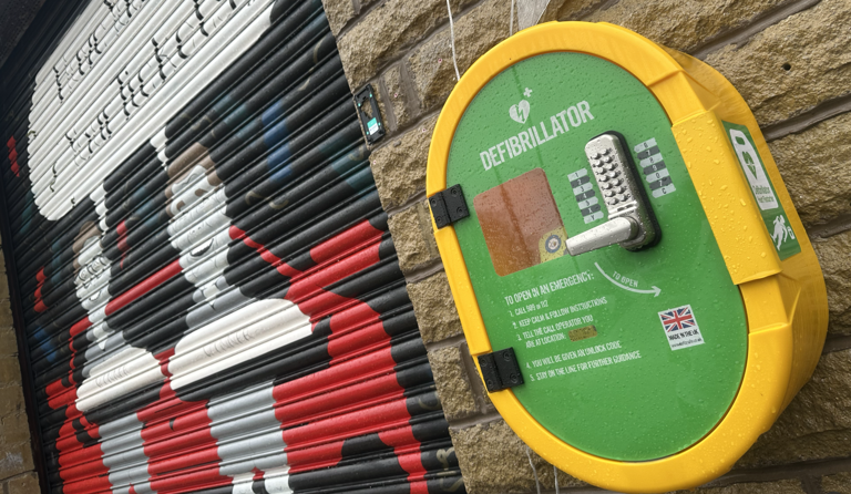 Cricket club defibrillator installed thanks to Buxton company