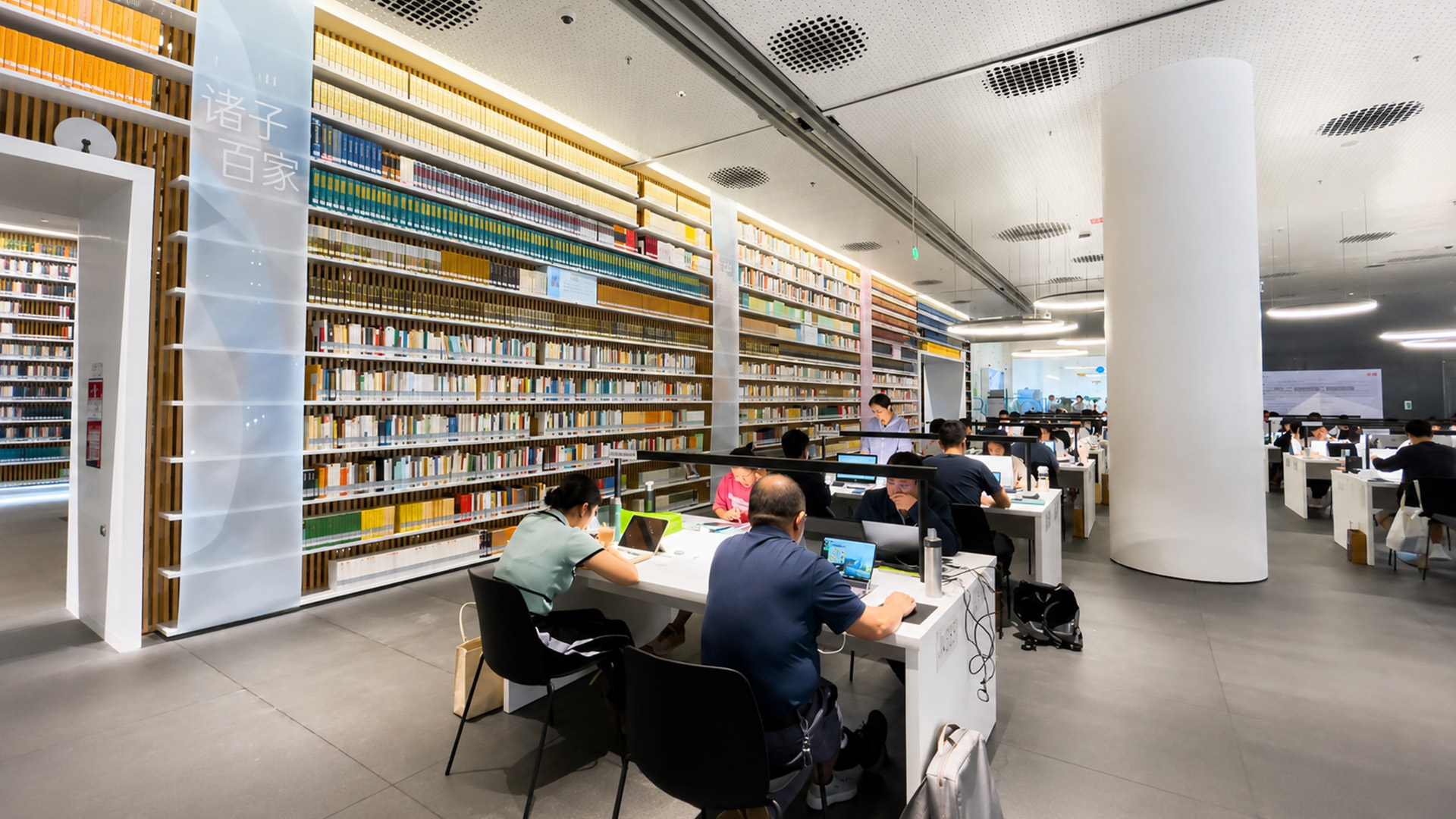 Inside a contemporary Chinese library filled with calm reading spaces