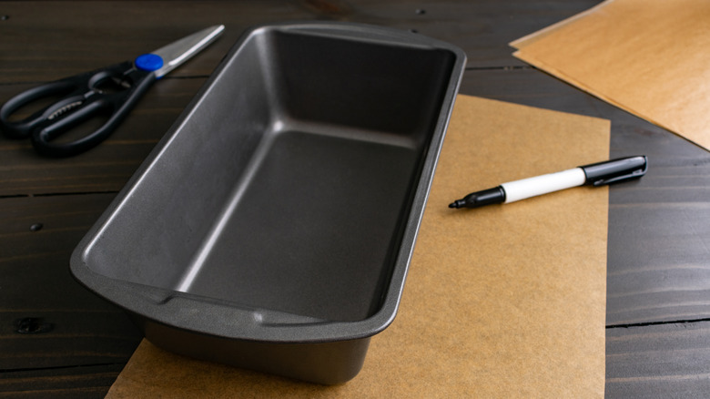 Upgrade a simple bread pan into a rustic planter box with an artsy DIY