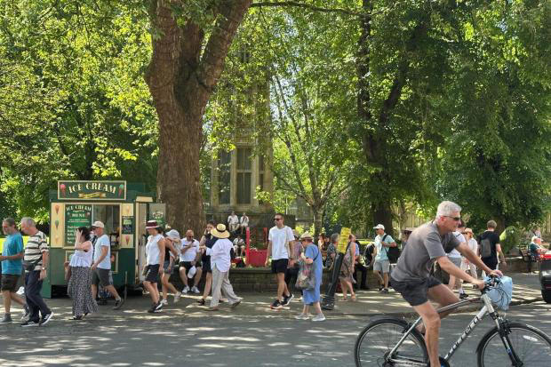 York swelters in the heat after 'tropical night' as crowds seek sun and ...