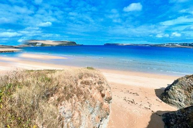 Man dies in sea off Cornish beach after trying to save family members