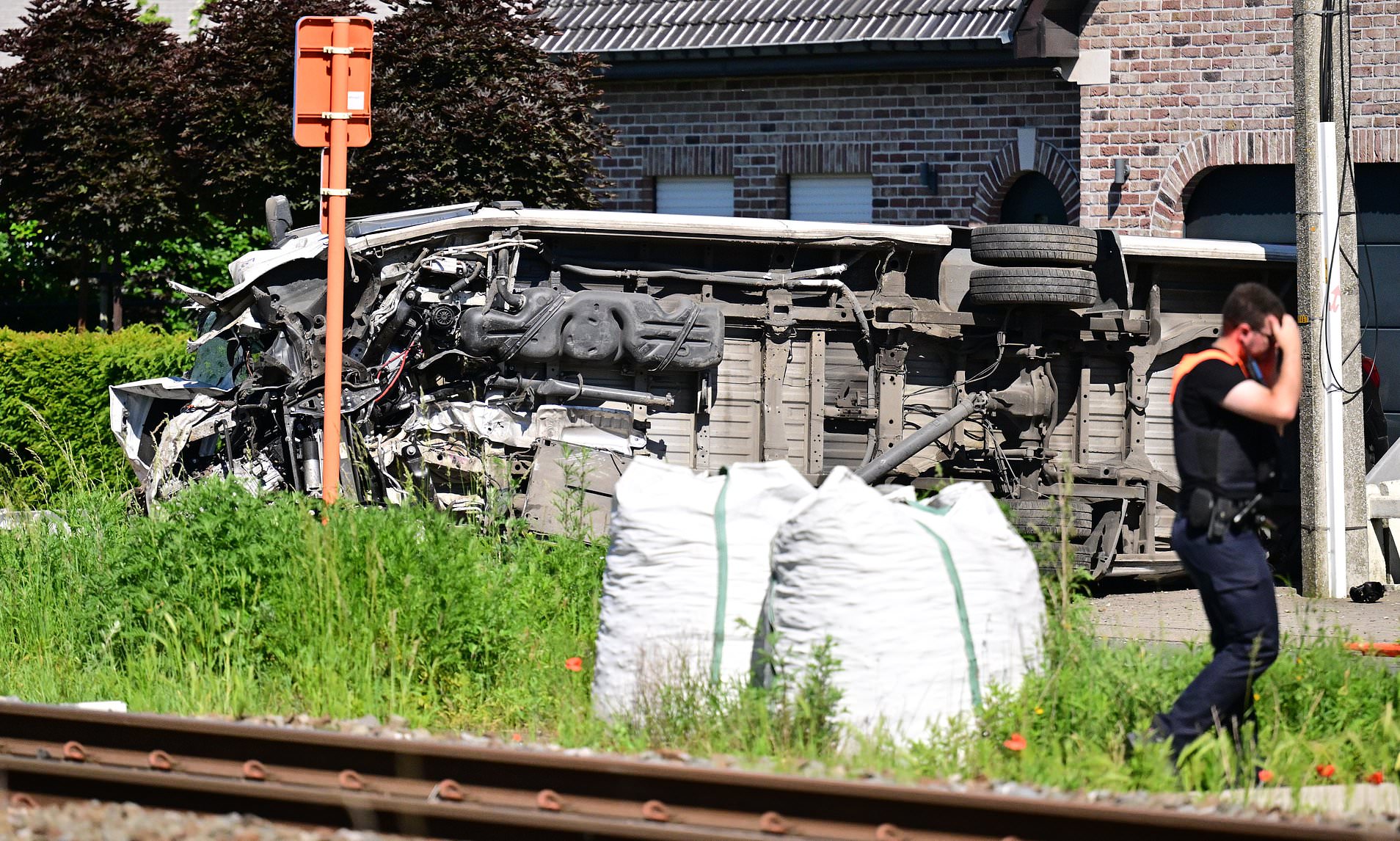 'Several killed' as school bus is hit by a train in Belgium