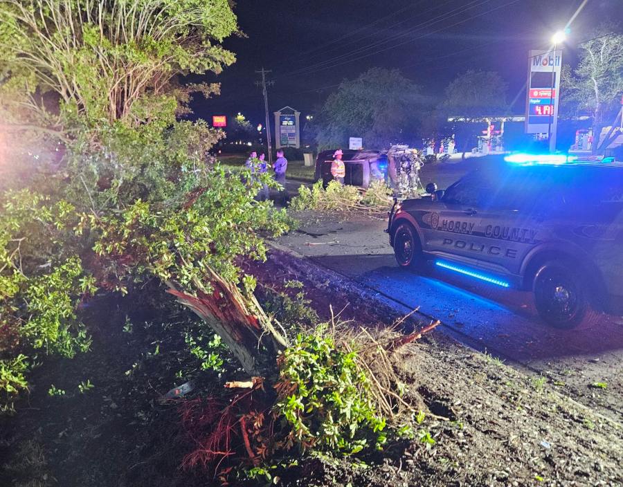 Car hits trees, overturns, catches fire on Carolina Forest Boulevard
