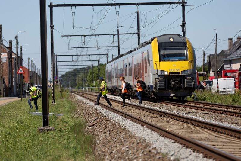 Train hits school minivan in Belgium, killing four including pupils
